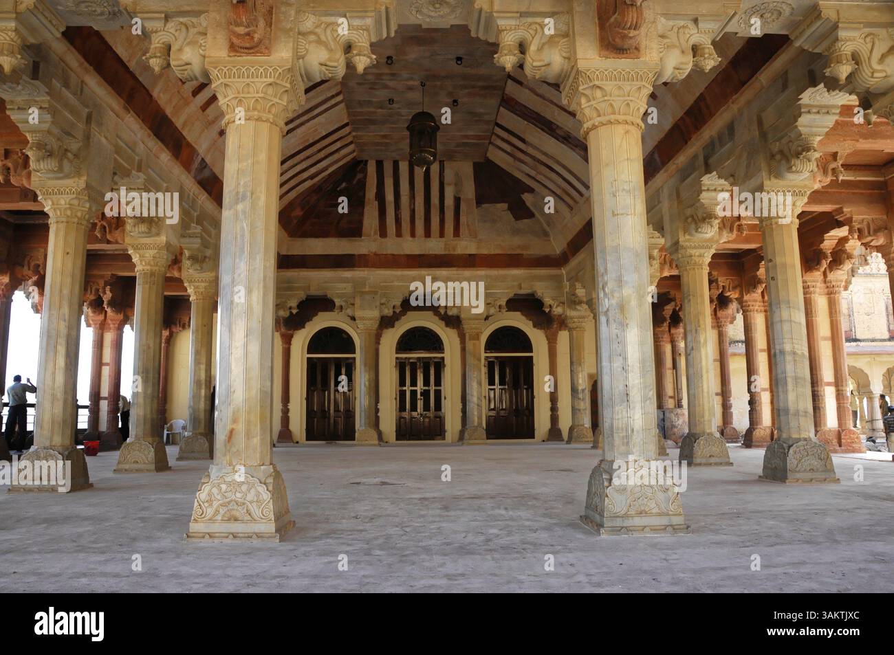 Jaipur City Palace, A magnificent palace interior with ornate columns ...