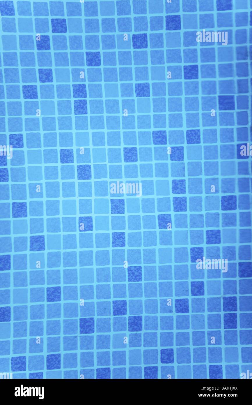 A fragment of blue pool tile, slightly distorted by invisible water ...