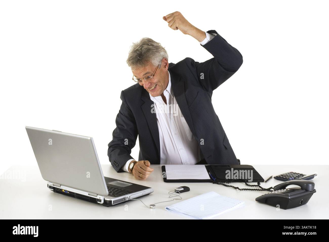 Angry businessman beating computer hi-res stock photography and images ...