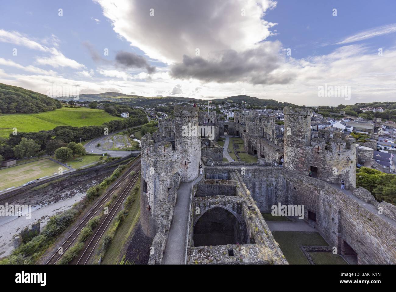 Conwy Castle, medieval castle with towers and surrounding town in a ...
