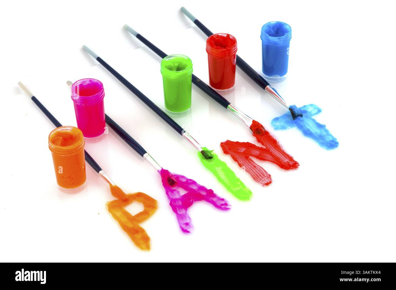 Painting text with brushes and containers Stock Photo - Alamy