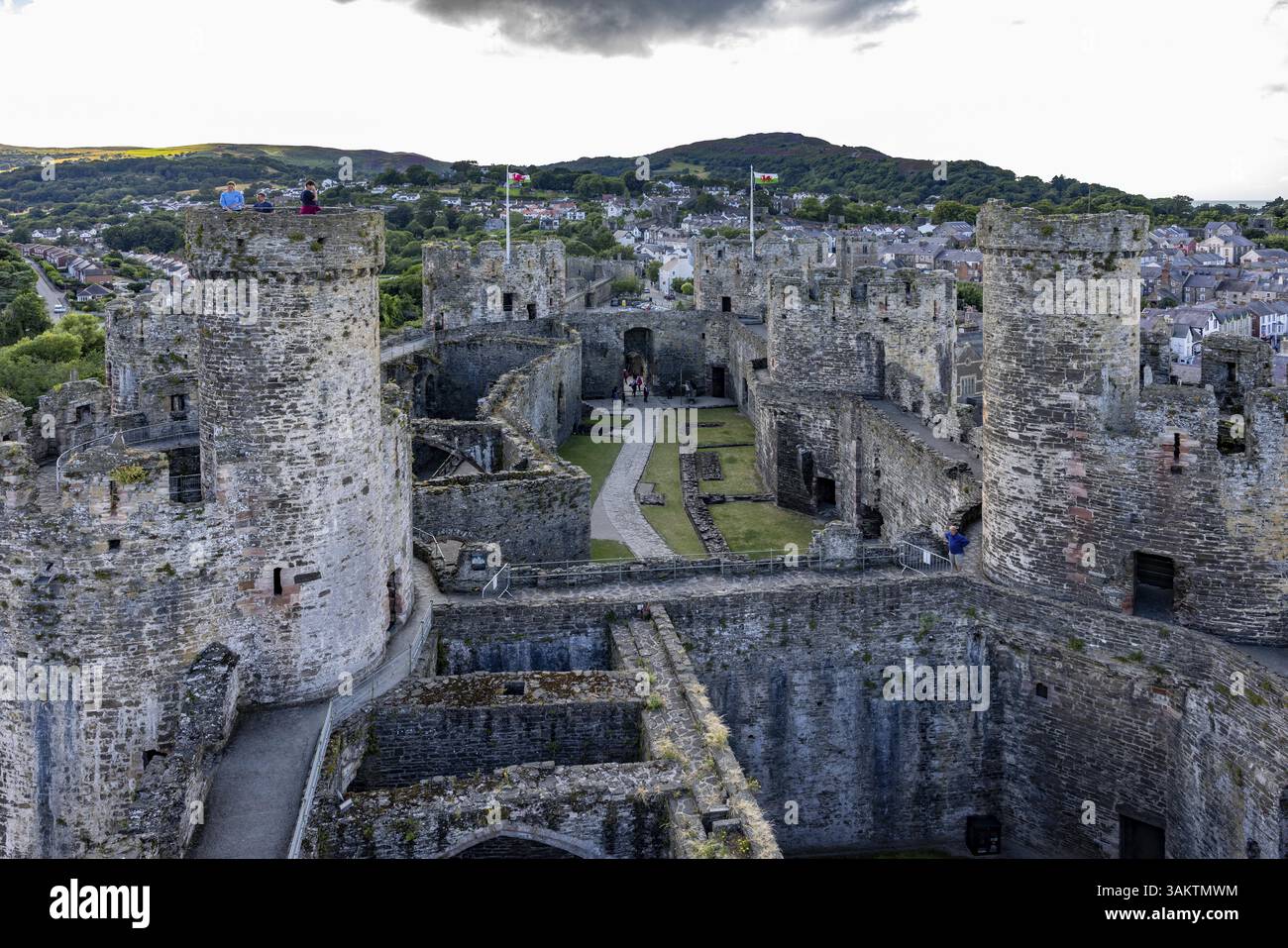 Conwy Castle, medieval castle with towers and surrounding town in a ...