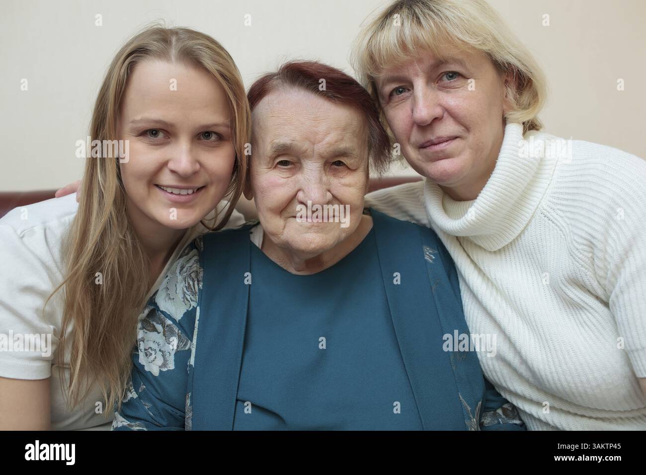 Family portrait of three generations. Mother, daughter and grandmother ...