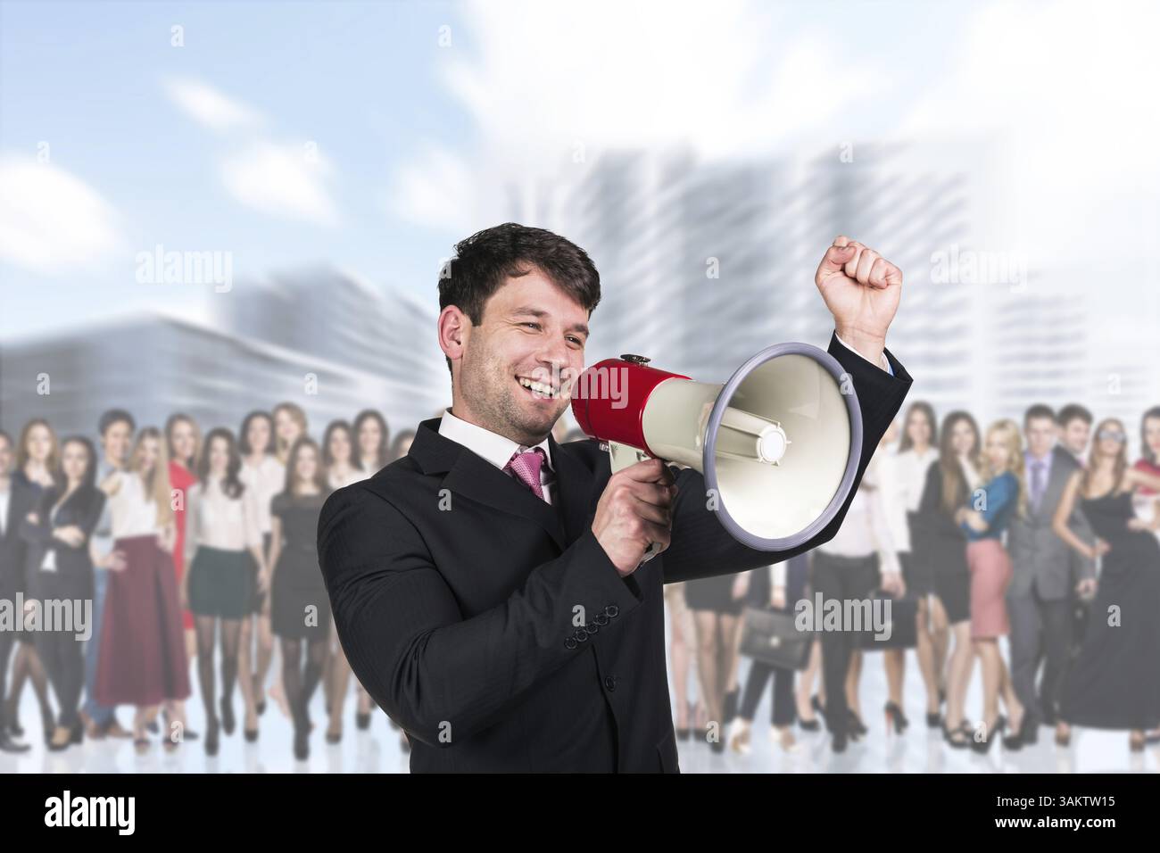 Business man stands foreground on the blurred crowd over white ...