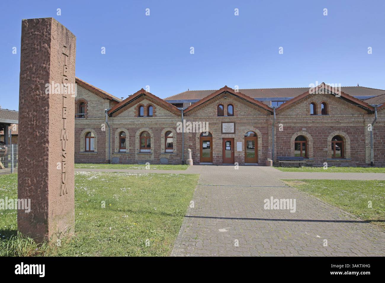Historic Brickworks Museum built in 1887 and stone stele with ...