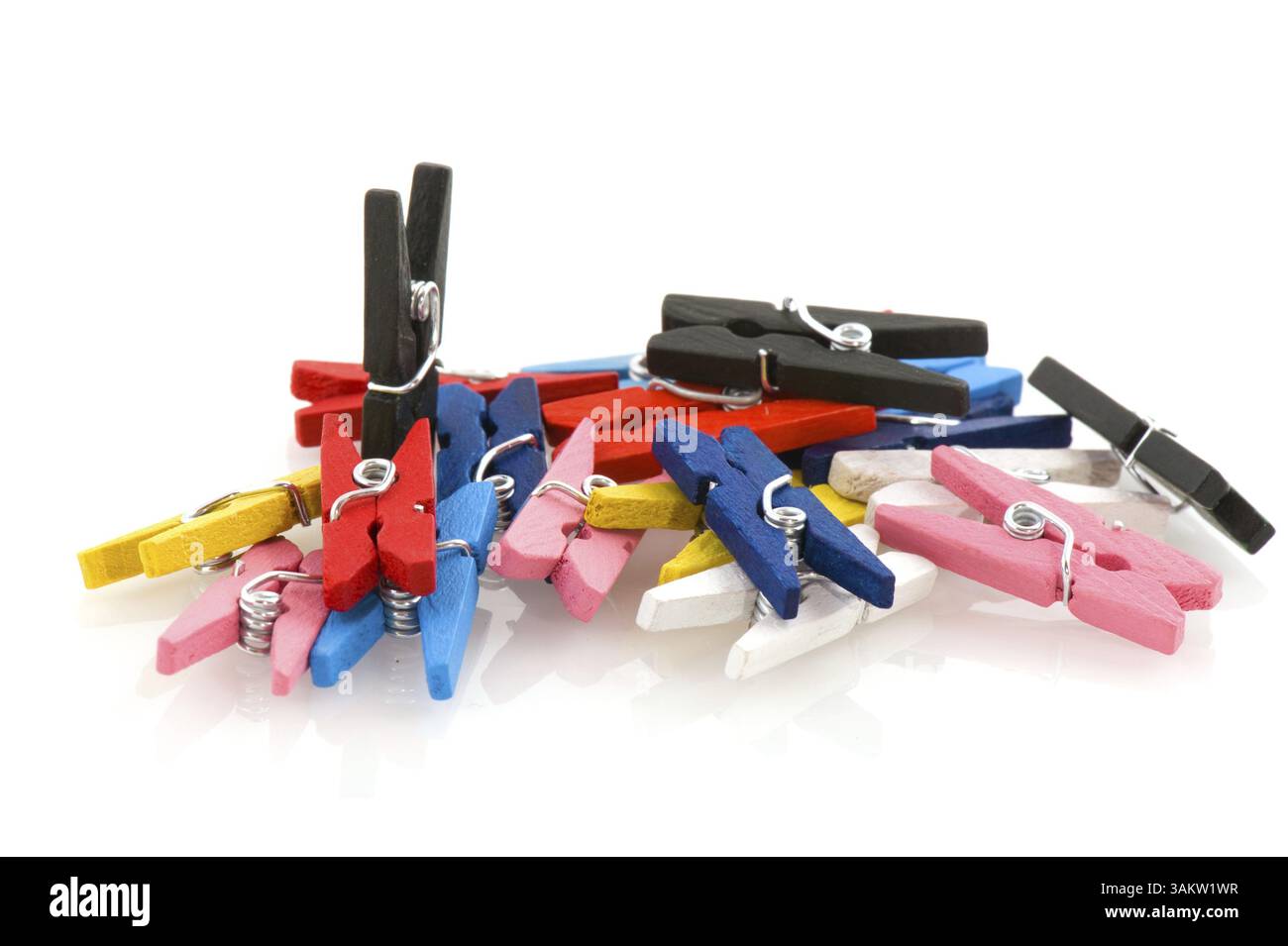 Colorful clothes pins for hanging the laundry Stock Photo - Alamy