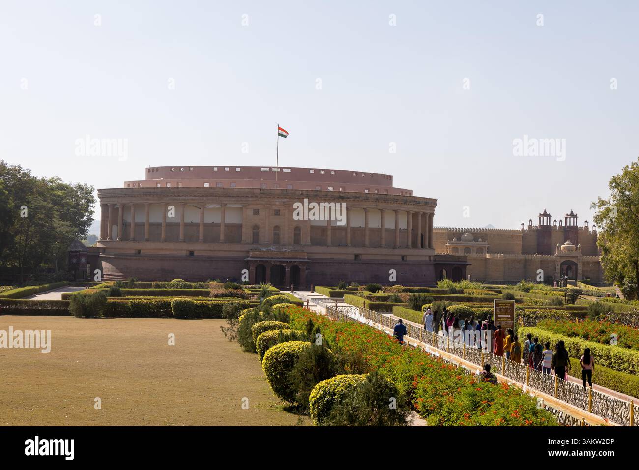 indian parliament replica in public park with bright blue sky at day ...