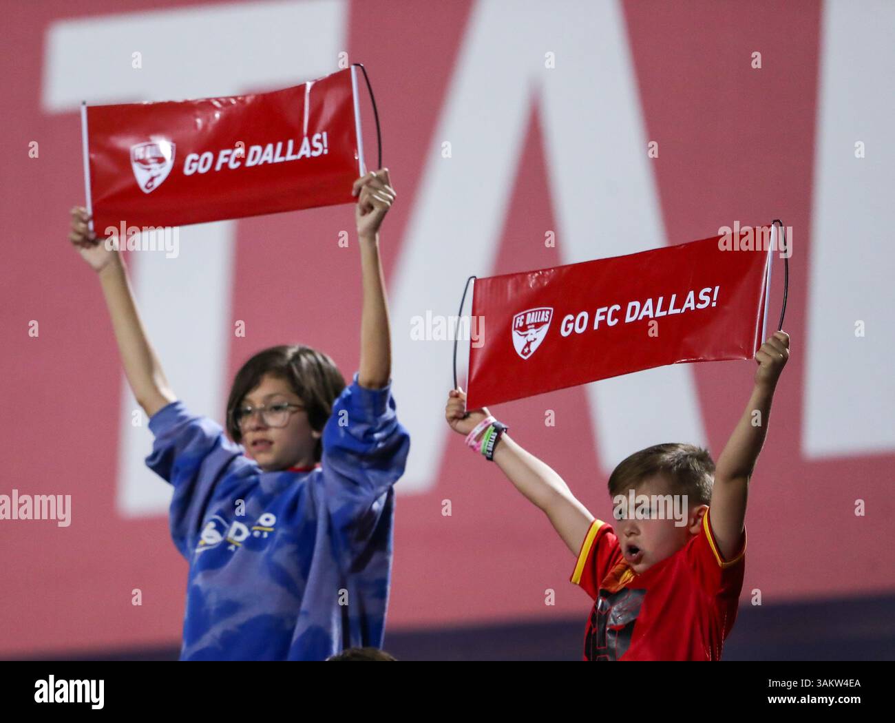 Frisco, Texas, USA. 12th Apr, 2025. Young FC Dallas fans hold FC Dallas ...