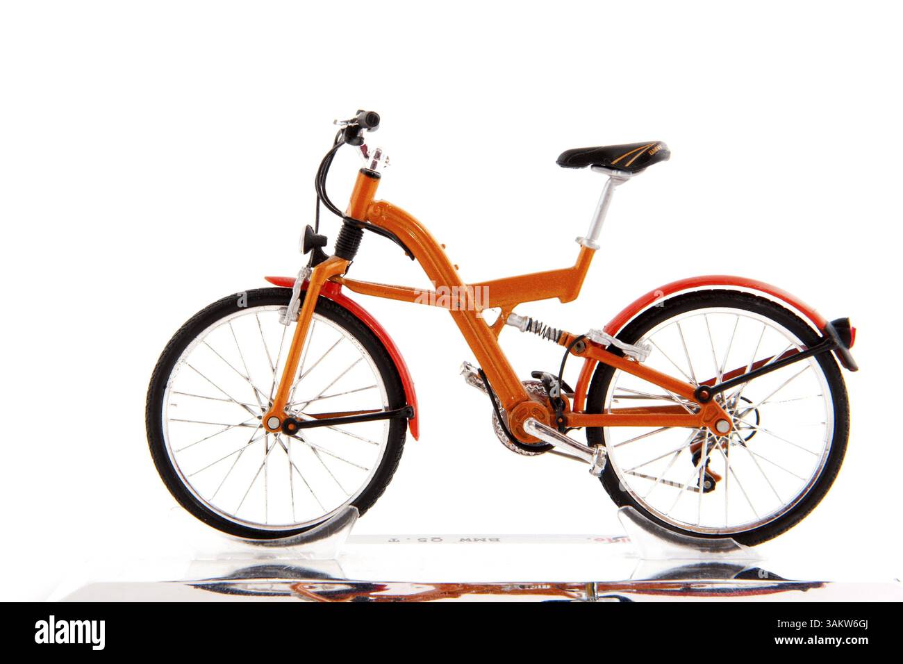 All terrain bike in orange isolated over white Stock Photo - Alamy