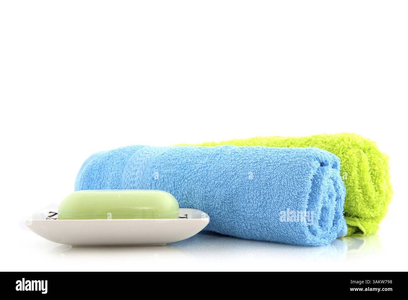Colorful towels with a piece of soap Stock Photo - Alamy
