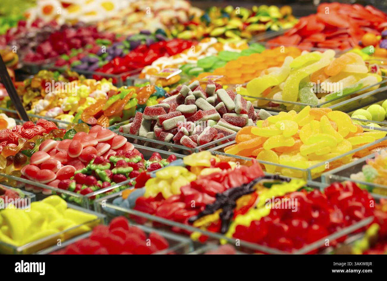 Marmalade candies store at the La Boqueria market in Barcelona. Shallow ...