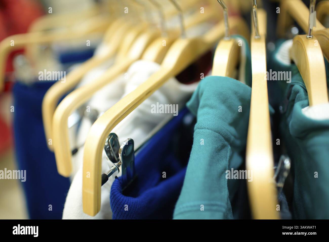 Racks store coat hangers hi-res stock photography and images - Alamy