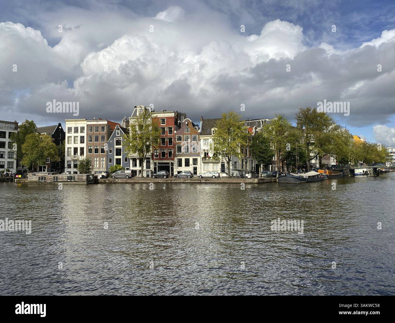 Amsterdam, Netherlands - October 2, 2019: Amsterdam canal with typical ...