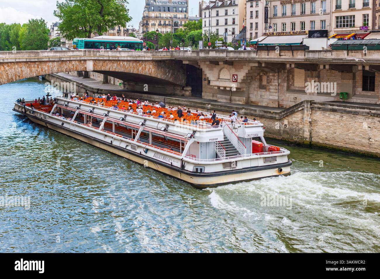 Paris, France - July 23, 2010 : Tour boat on the south branch of Seine ...