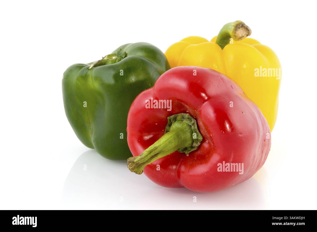 Three colored paprika isolated on white Stock Photo - Alamy