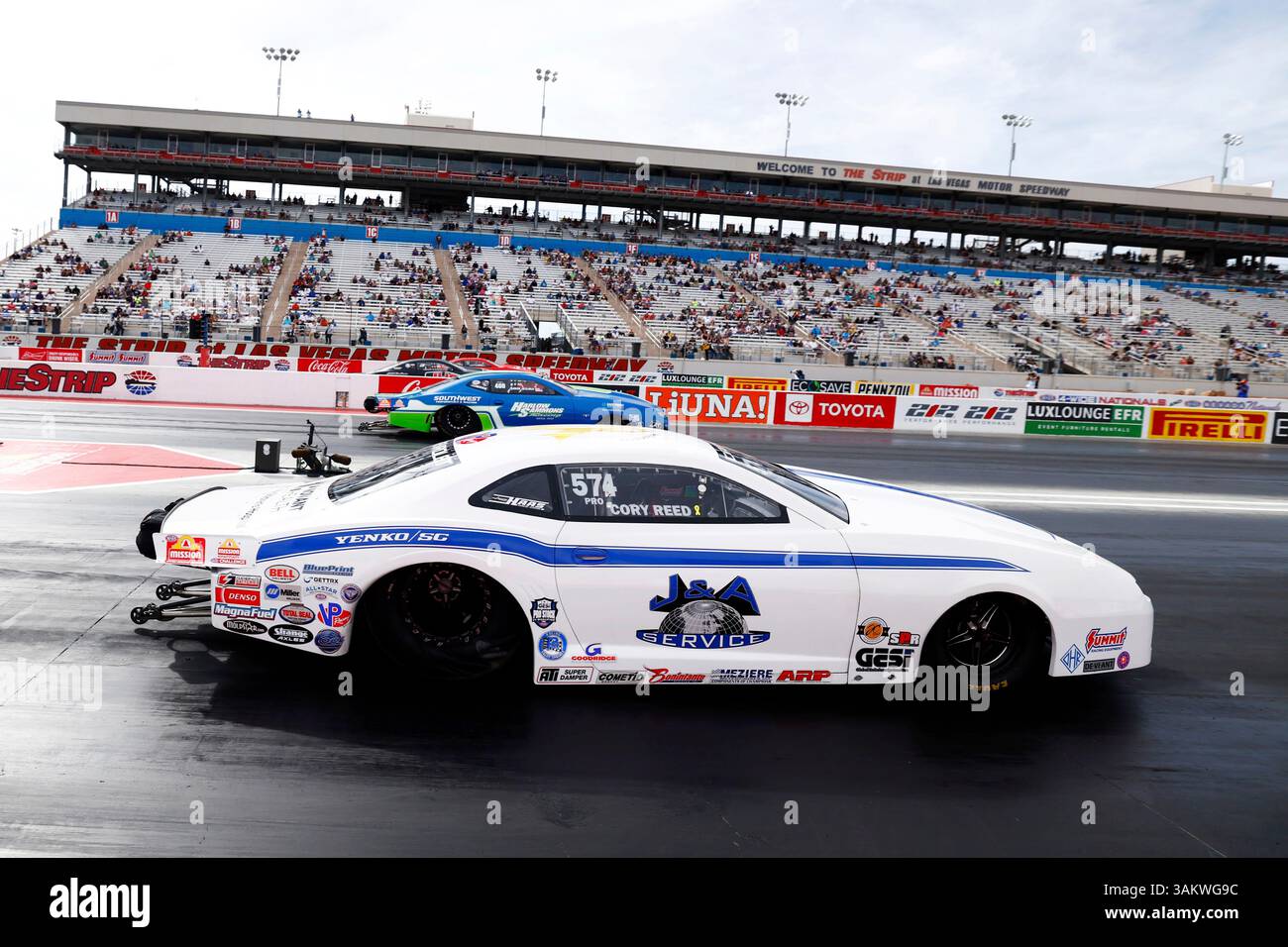 LAS VEGAS, NV - APRIL 12: Cory Reed (574 PRO, near lane) NHRA Pro Stock ...