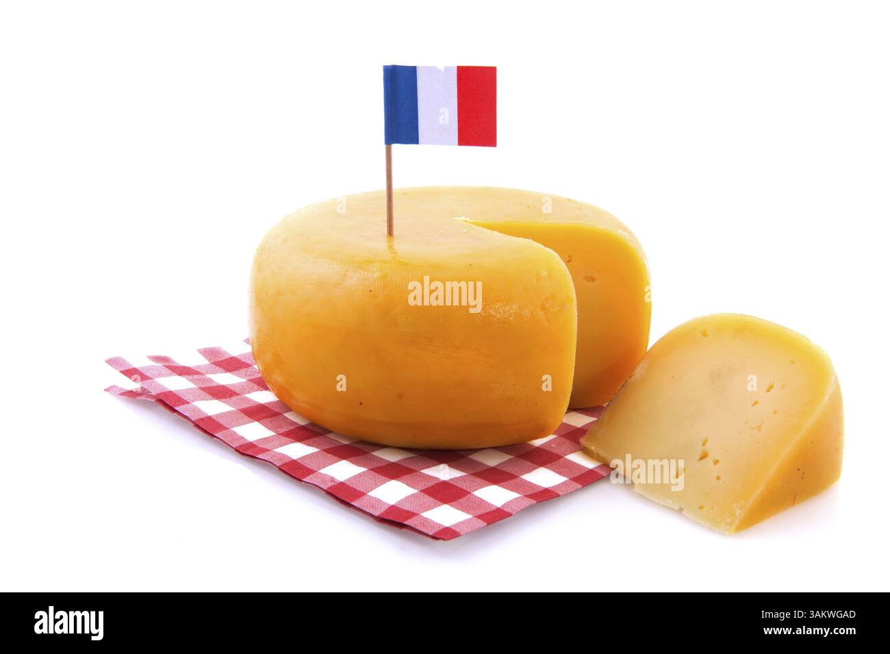 Whole French cheese with piece and flag Stock Photo - Alamy