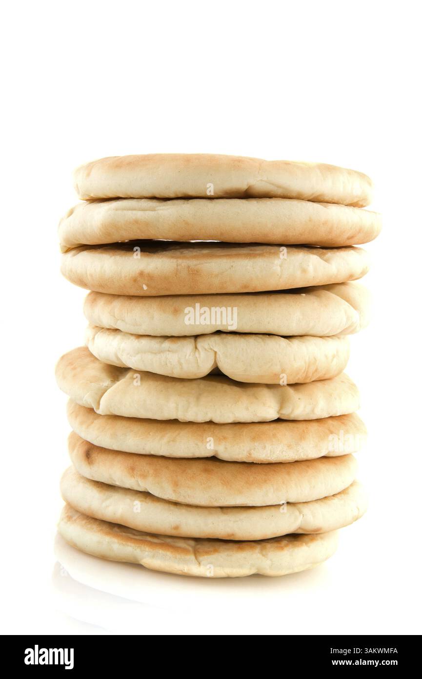 A pile of flat bread isolated over white Stock Photo - Alamy