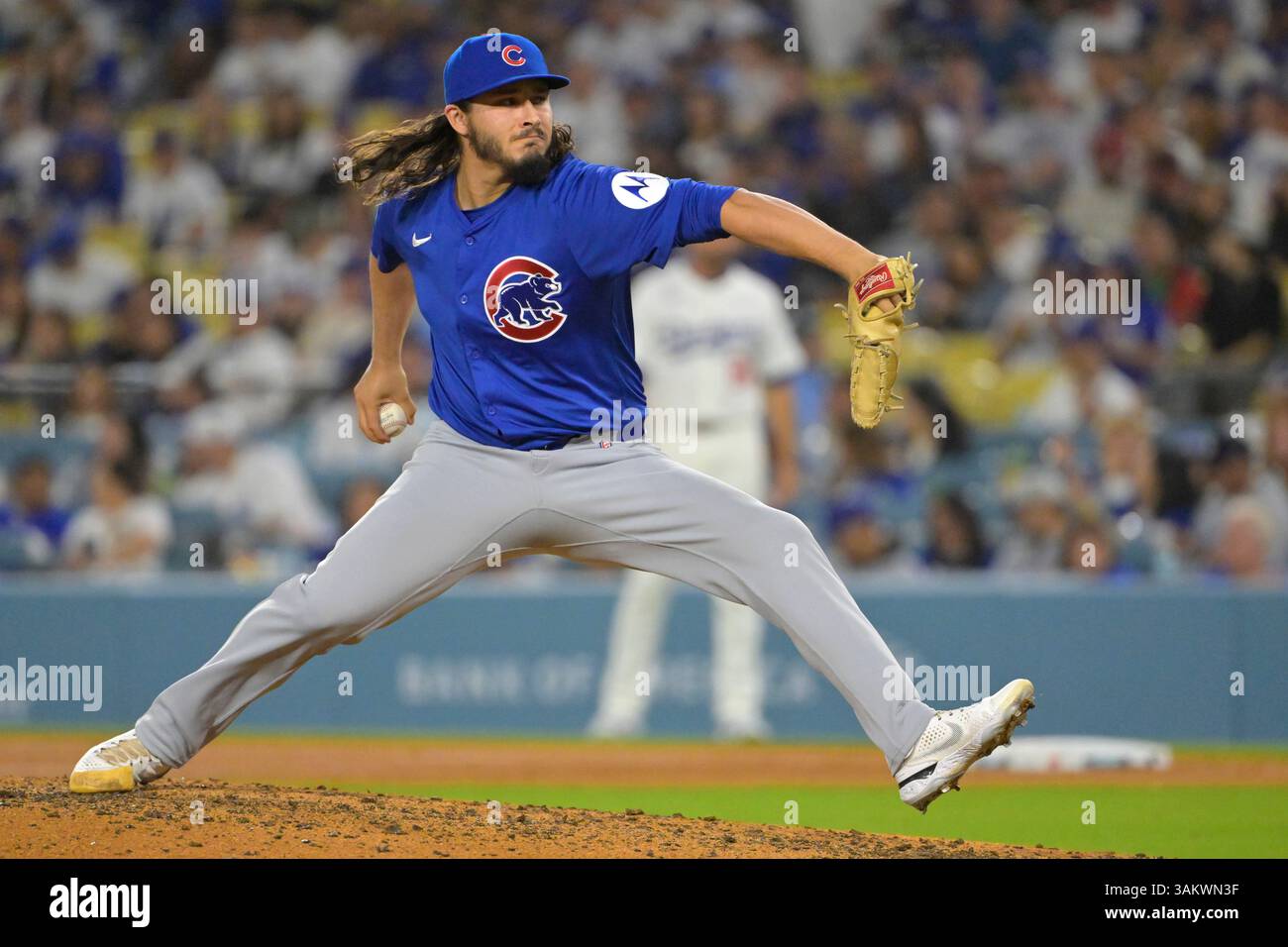 Chicago Cubs relief pitcher Eli Morgan delivers to the plate during the ...