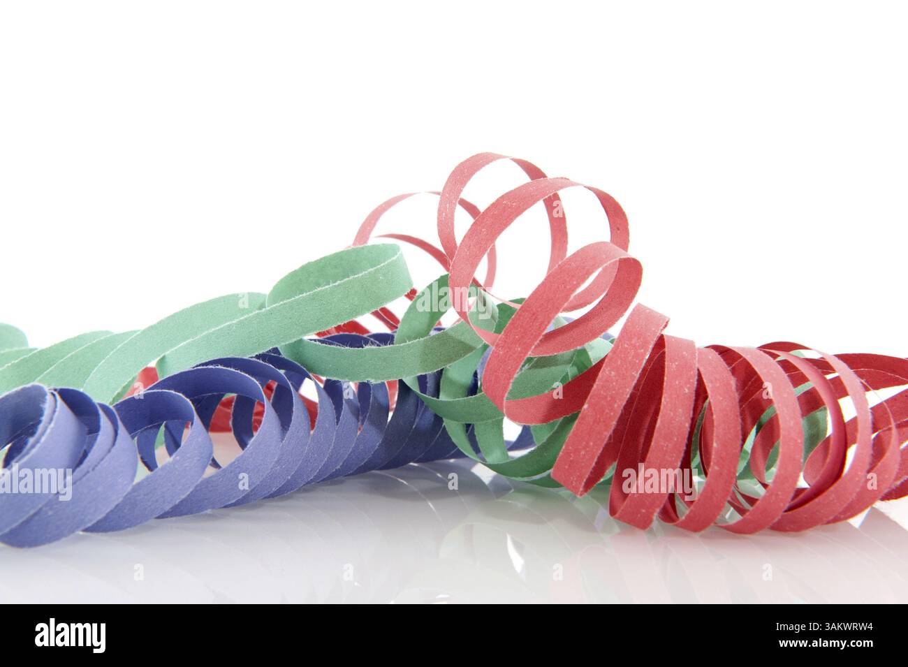 Colorful party streamers from paper isolated over white Stock Photo - Alamy