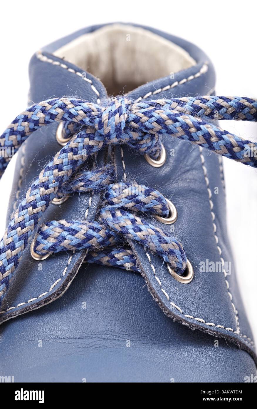 One blue baby shoe with angry face. Cartoon character Stock Photo - Alamy