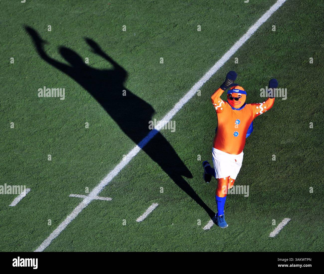 December 21, 2013: Las Vegas, NV. Zappos mascot runs on the field ...