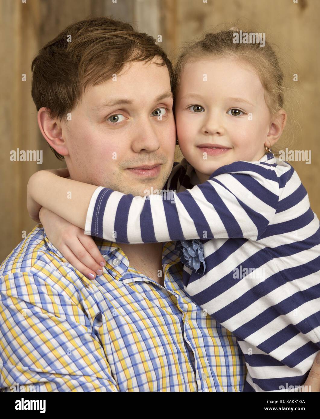 Happy hugging faces father hi-res stock photography and images - Alamy
