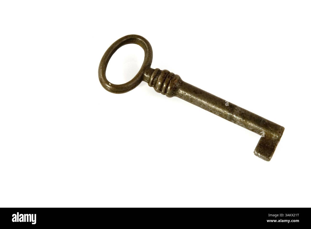 Old fashioned key to open doors Stock Photo - Alamy