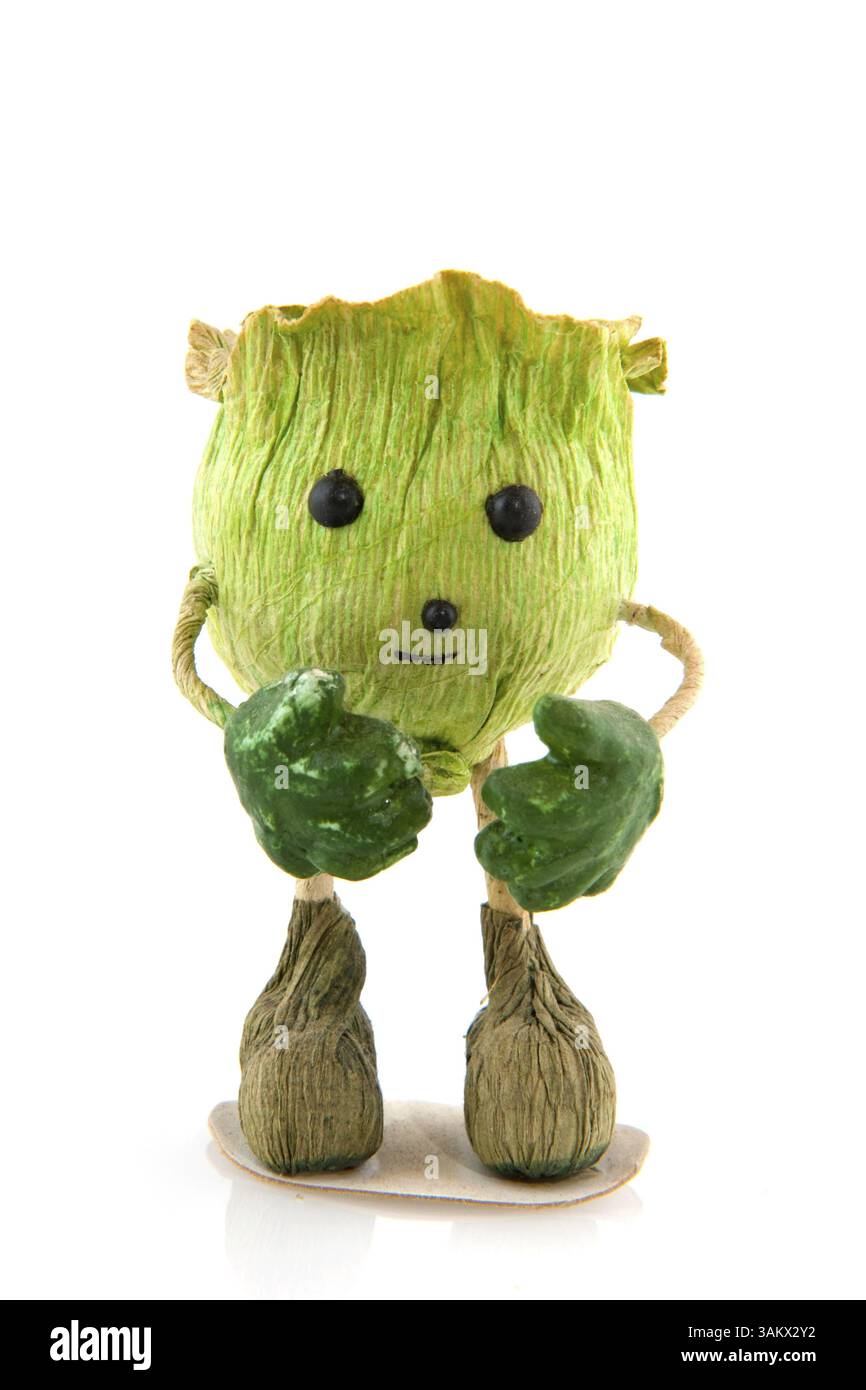Funny vegetable salad with face hands and feet Stock Photo - Alamy