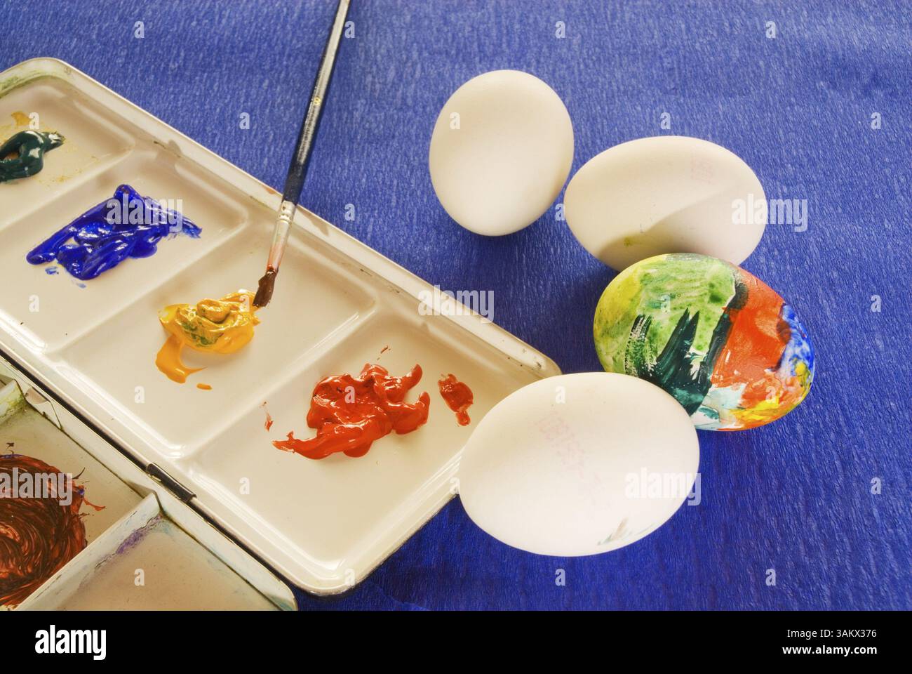 Paint in several colors for the easter artist Stock Photo - Alamy