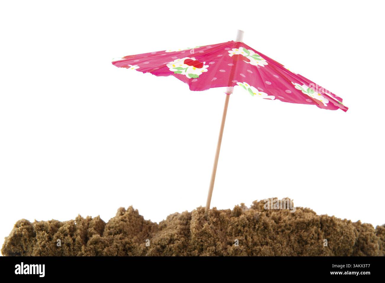 Pink parasols in the beach with summer flowers Stock Photo - Alamy