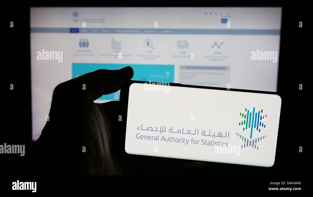 Stuttgart, Germany - 11-22-2024: Person holding mobile phone with logo ...