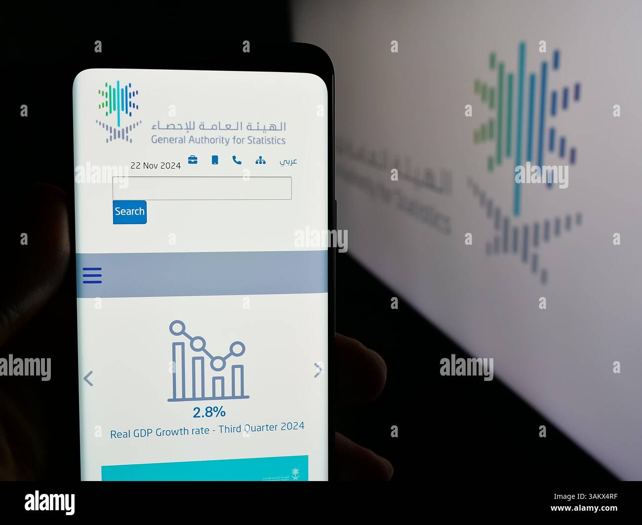 Stuttgart, Germany - 11-22-2024: Person holding mobile phone with ...