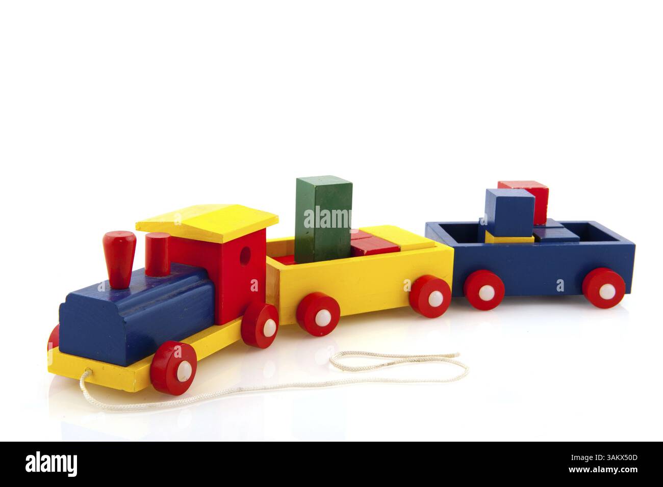 Wooden toy train with colorful blocks locomotive and wagons Stock Photo ...