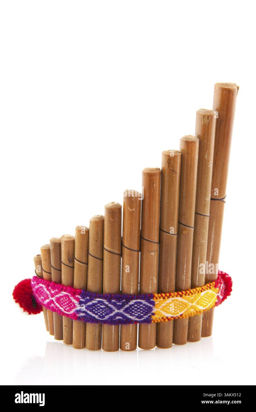 Peruvian pan flute or pipe isolated over white Stock Photo - Alamy