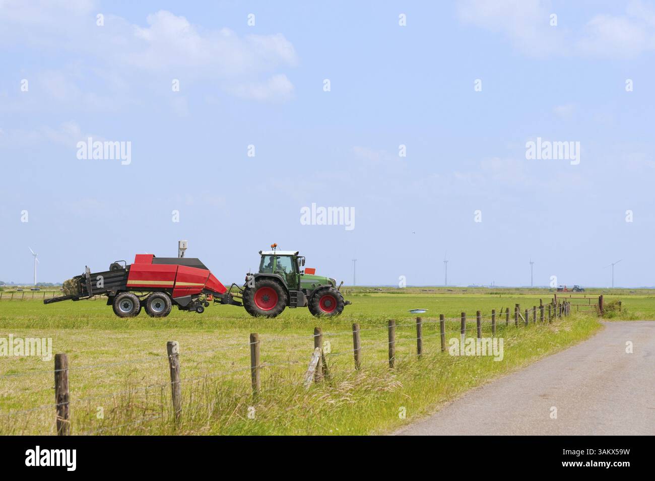 Typical Dutch landscape with tractor and farmland Stock Photo - Alamy