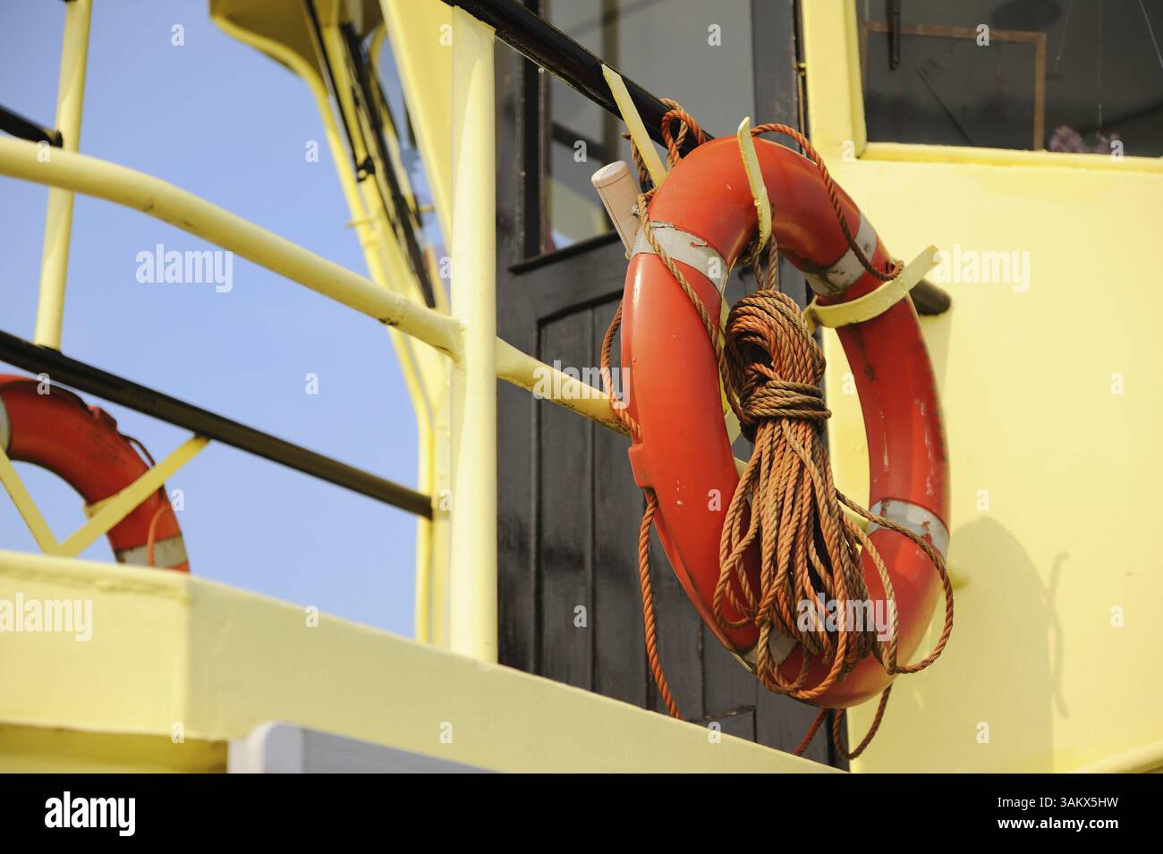 Life buoy at the boat Stock Photo - Alamy