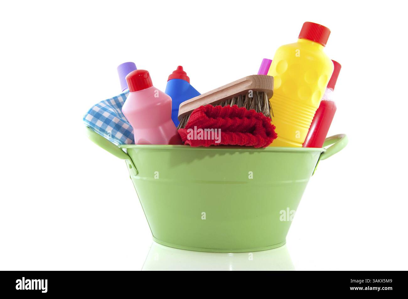 Green bucket full with cleaning products isolated over white Stock ...