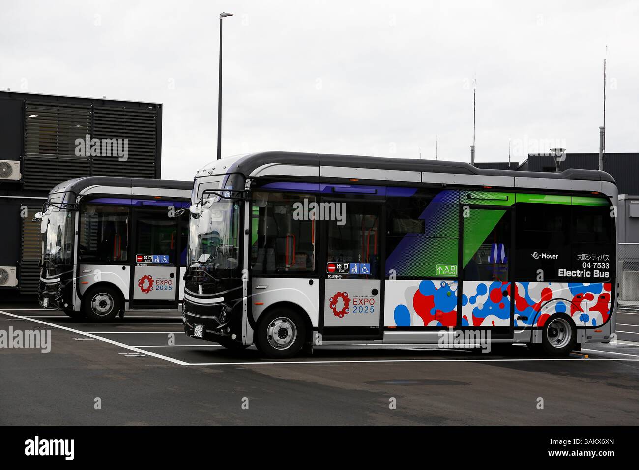 Osaka, Kansai, Japan. 13th Apr, 2025. Electric buses (e Mover) are seen ...