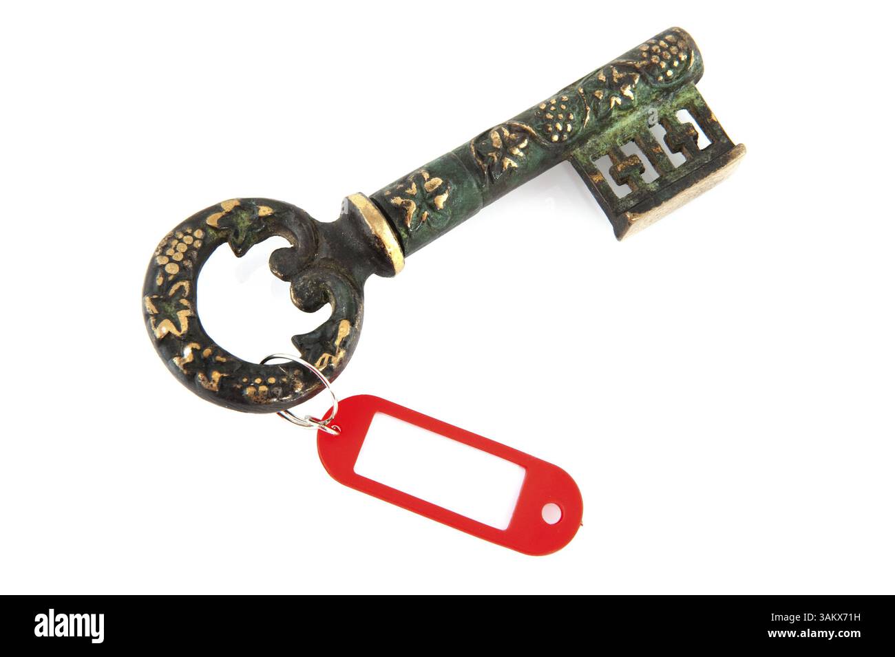 Antique key with label to write on Stock Photo - Alamy