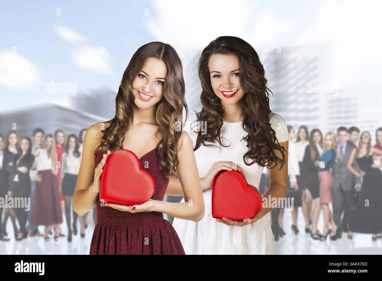 A group of business people stand foreground on the blurred crowd over ...