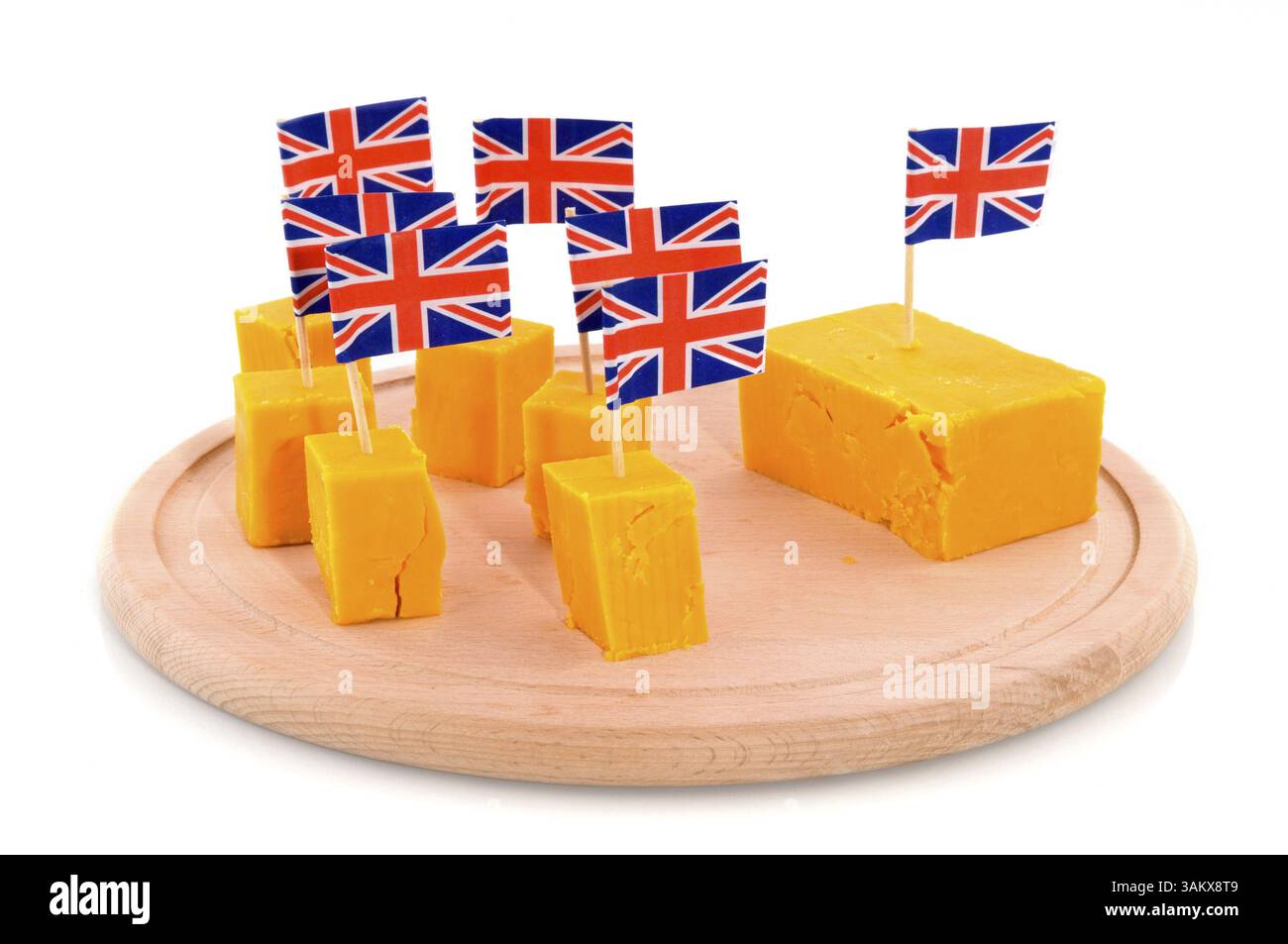 Cubes cheddar cheese from England with flags Stock Photo - Alamy