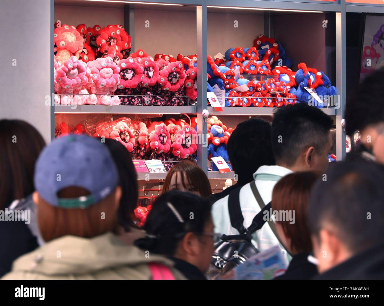 Osaka, Japan. 13th Apr, 2025. People queueup to buy souvenirs at the World EXPO 2025 Osaka ...