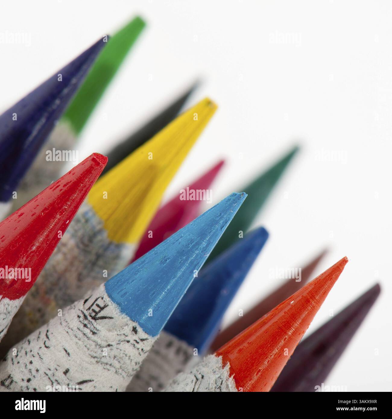 Chinese color pencils made from newspapers over white Stock Photo - Alamy