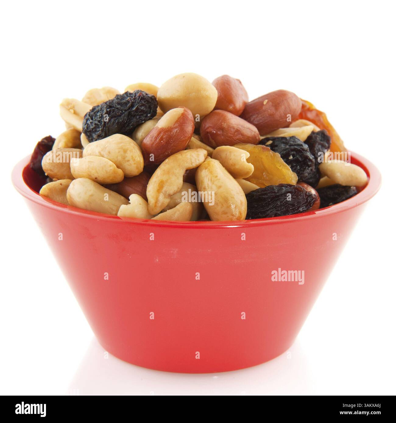 Mixed peanuts in a modern blue plastic bowl Stock Photo - Alamy