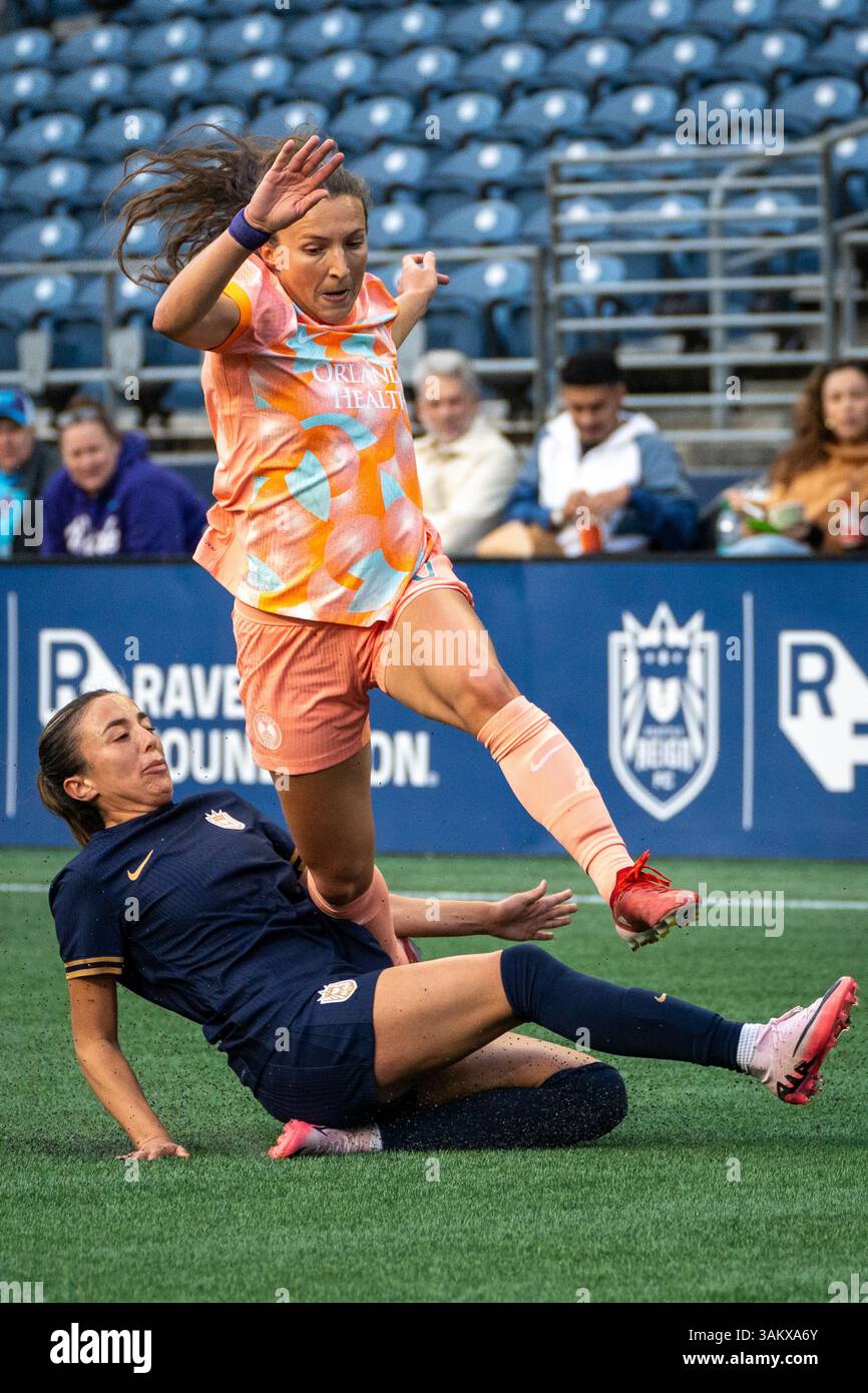 Seattle Reign FC defender Madison Curry (24) slide tackles Orlando ...