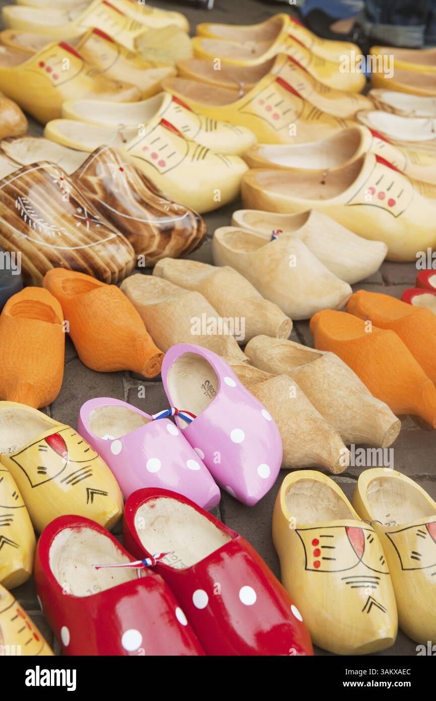Many Dutch wooden clogs at the market Stock Photo - Alamy