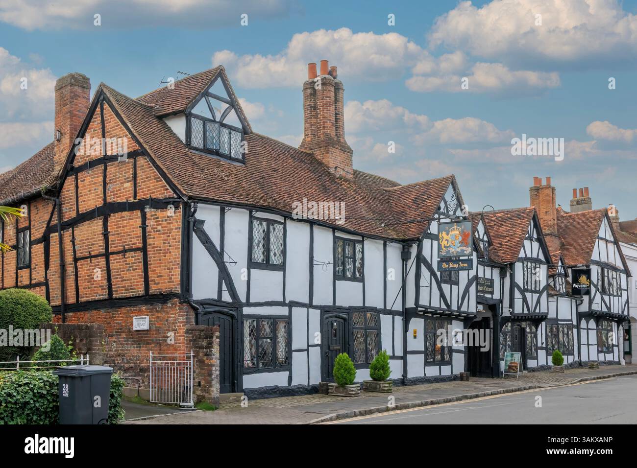 A row of preserved historic timber-framed buildings featuring black and ...