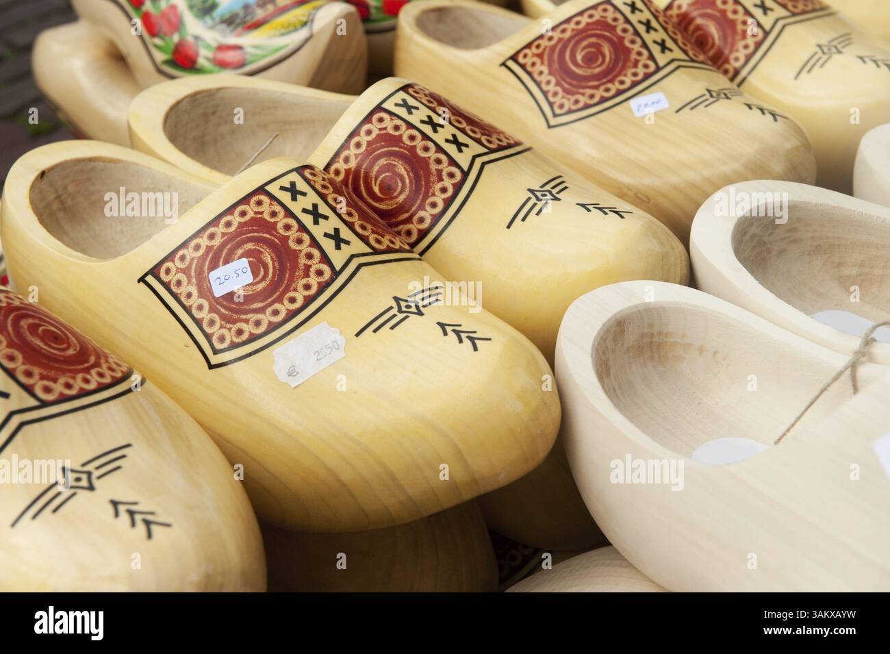 Many different Dutch wooden clogs at the market in Holland Stock Photo ...