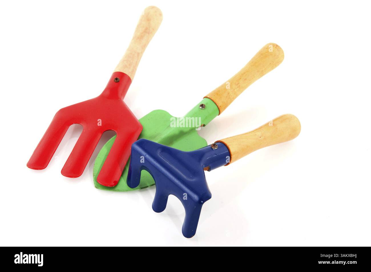 Little tools for working in the garden isolated over white Stock Photo ...